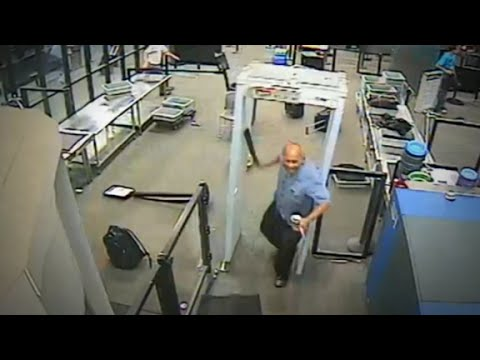 Video: Surveillance footage shows man storm TSA checkpoint with machete ...